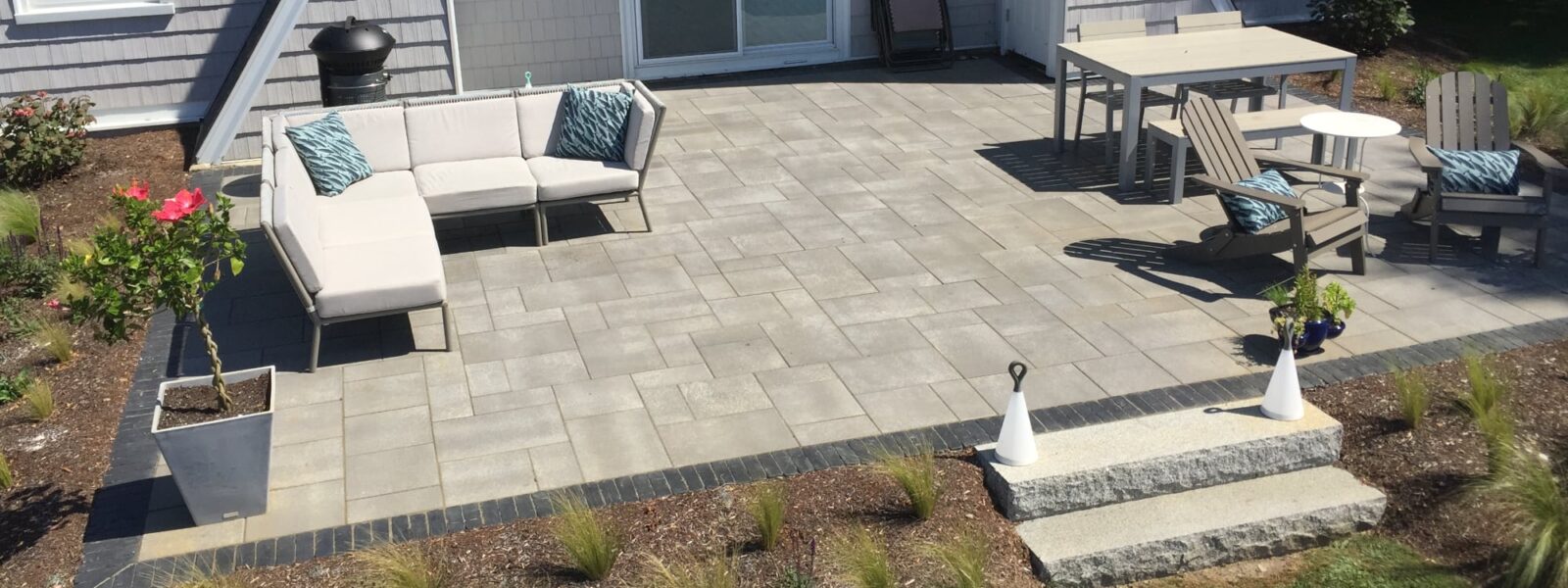 Paver Patios vs. Decks • Coastal Masonry Rhode Island